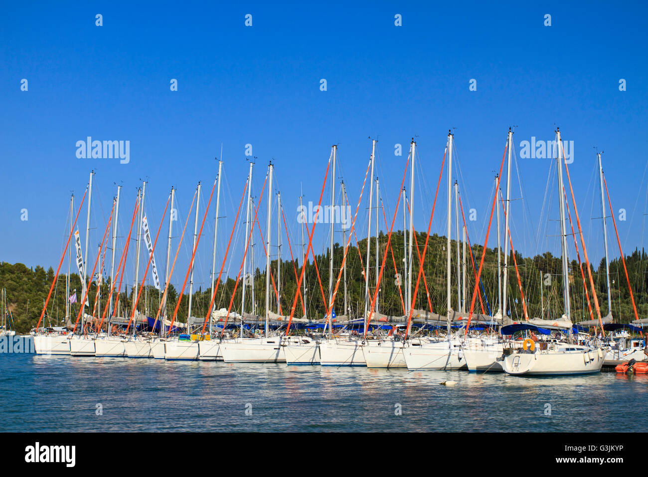 Sailing boats in harbor Stock Photo - Alamy