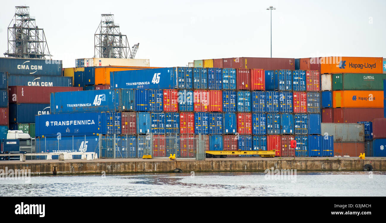 Shipping containers and ship at Tilbury Docks in London Stock Photo - Alamy