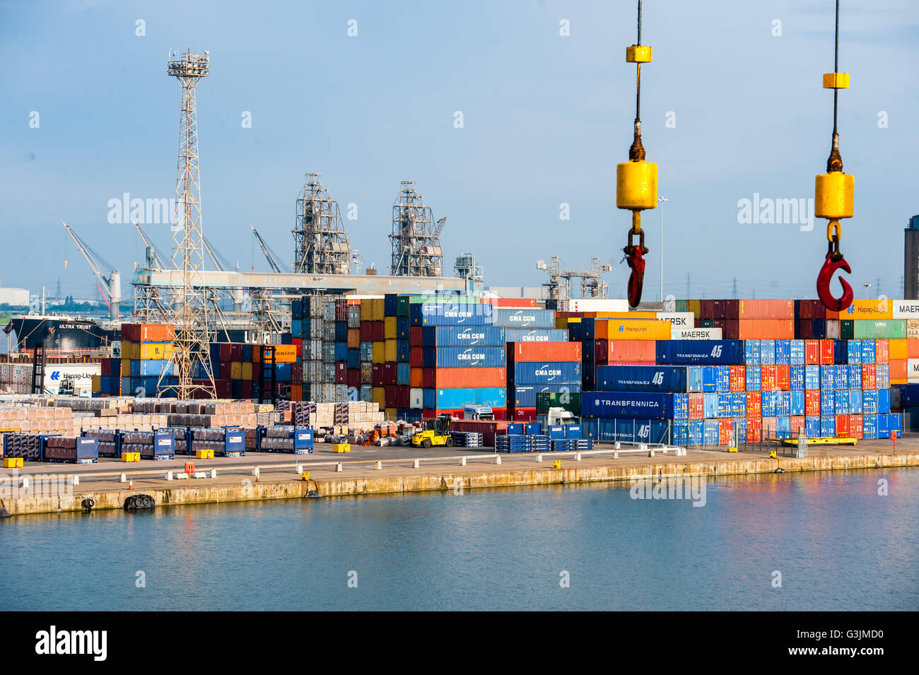 Shipping containers and ship at Tilbury Docks in London Stock Photo - Alamy