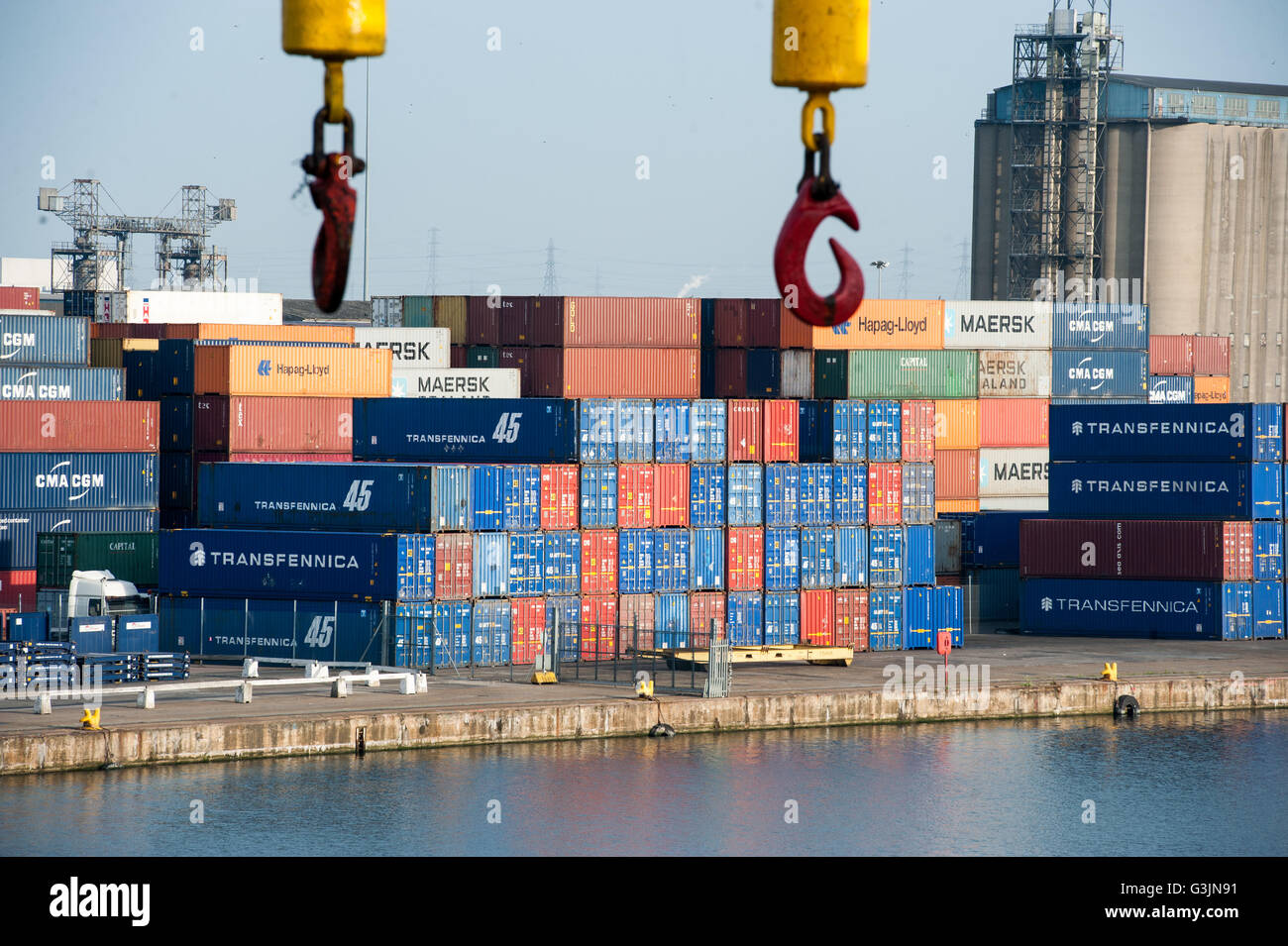 Shipping containers and ship at Tilbury Docks in London Stock Photo - Alamy