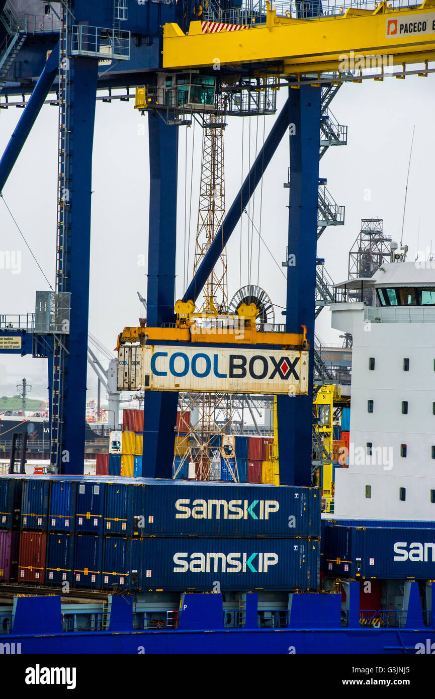 Shipping containers and ship at Tilbury Docks in London Stock Photo - Alamy