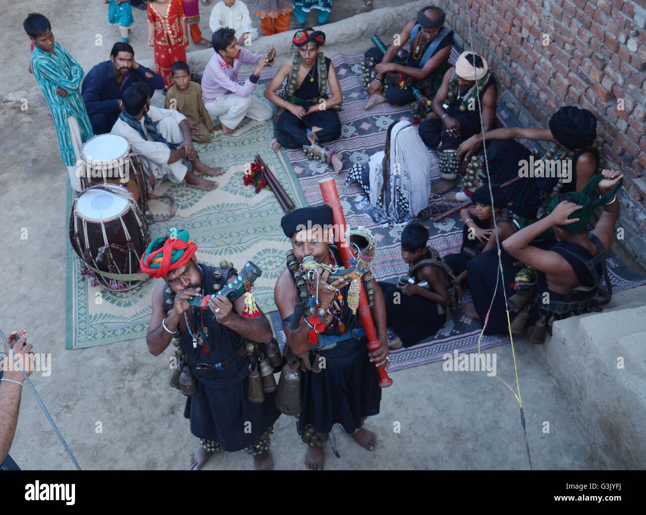 Lahore, Pakistan. 20th Apr, 2016. Pakistani devotees (Malang) blows ...