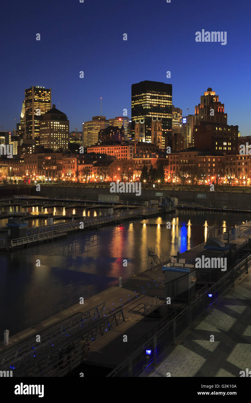 The night view of Old Port of Montreal with downtown skyline of ...