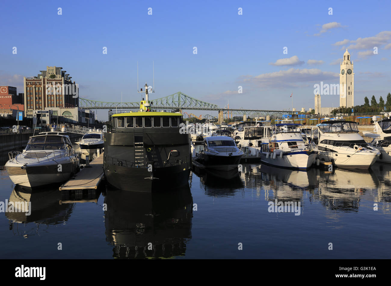 Montreal Clock Tower aka Sailors' Memorial Clock with yachts docking in ...