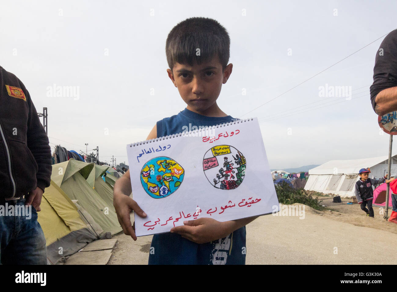 Syrian boy writing hi-res stock photography and images - Alamy