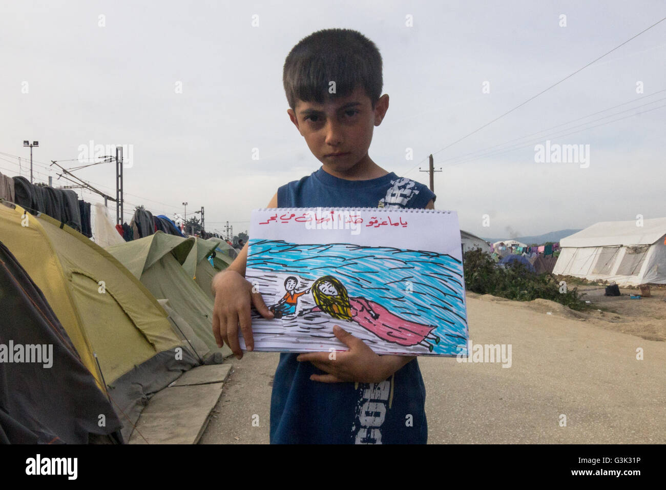 Syrian boy writing hi-res stock photography and images - Alamy