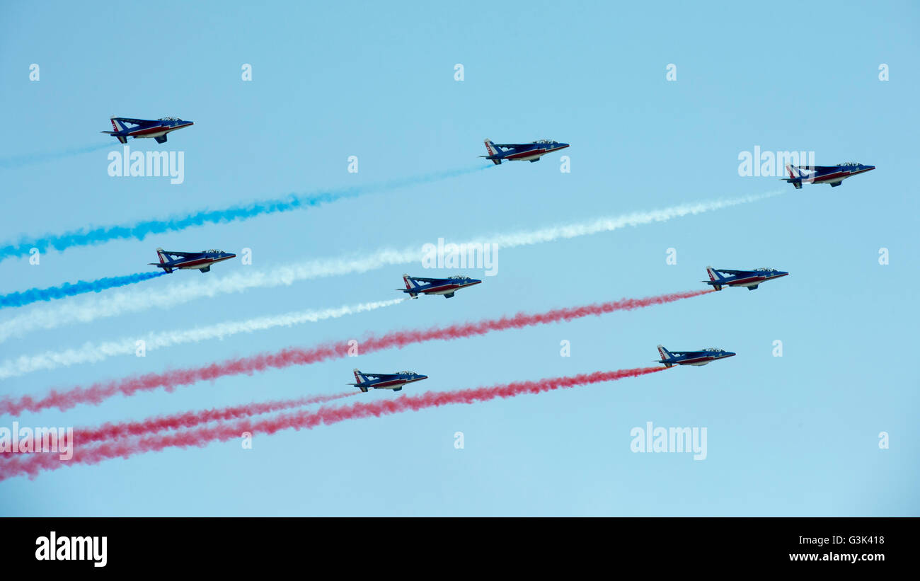 French Acrobatic Team Alpha Jets in formation streaming red, white and ...