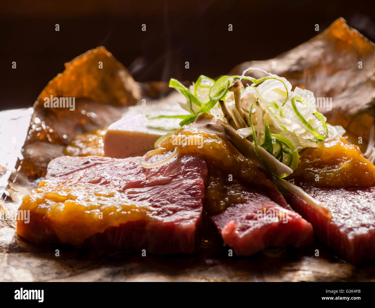 Cooking the delicious Japanese Hida Beef with garlic, onion, tofu Stock ...
