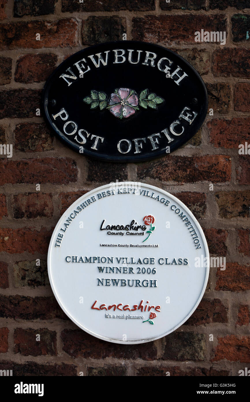 Plaques on Newburgh post office, Lancashire, England, UK Stock Photo ...