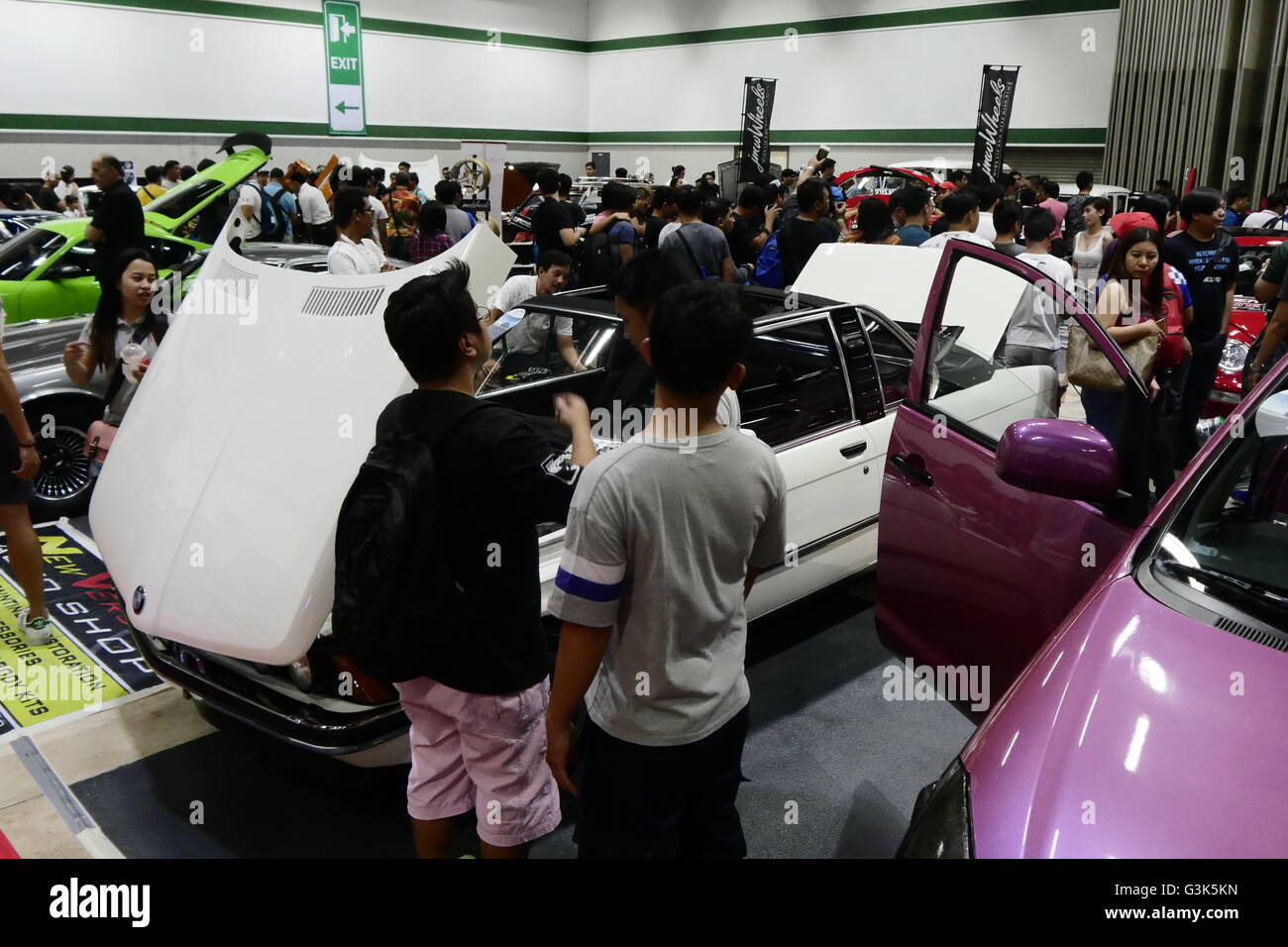 Crowd looking at the vintage cars. Manila International Auto Show, the ...