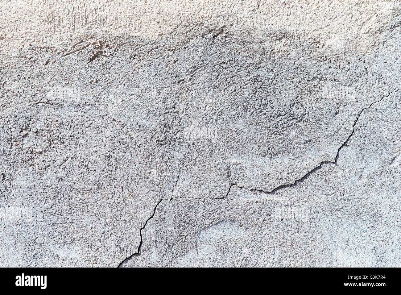 Grey concrete wall with traces in close-up Stock Photo - Alamy
