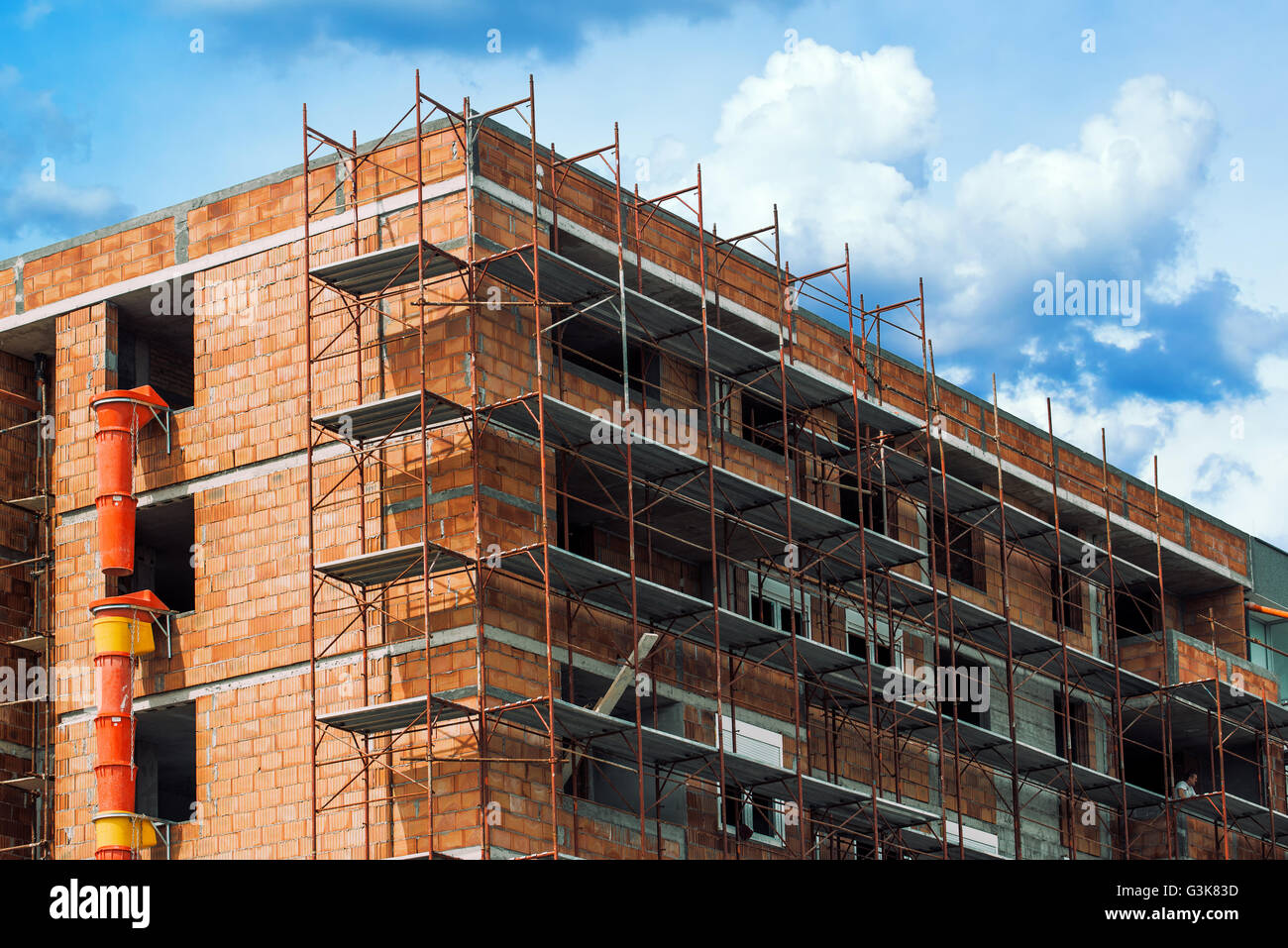 Scaffolding around the unrendered and unplastered building at ...