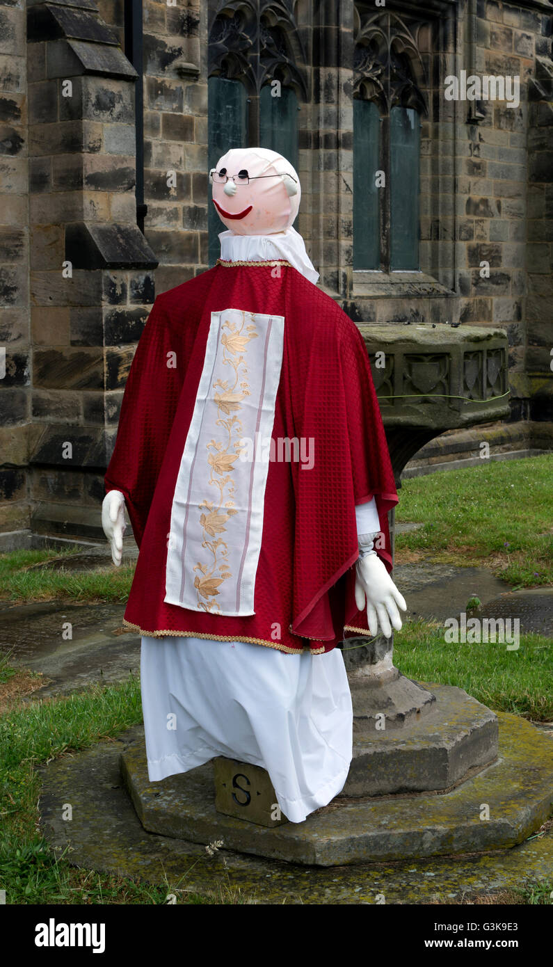Vicar scarecrow by St. Cuthbert`s Church, Halsall, Lancashire, England ...