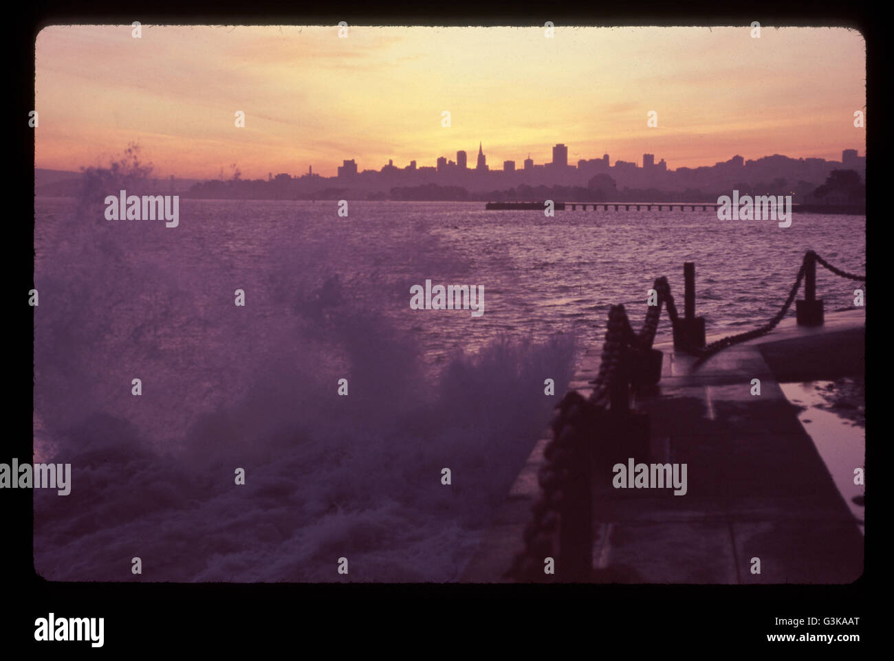 San Francisco, storm waves under Golden Gate Bridge reaching over ...