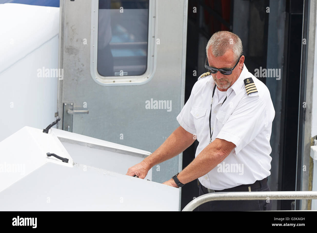 Captain Of A Catalina Express SeaCat Ferry, Manoeuvres His Vessel At ...