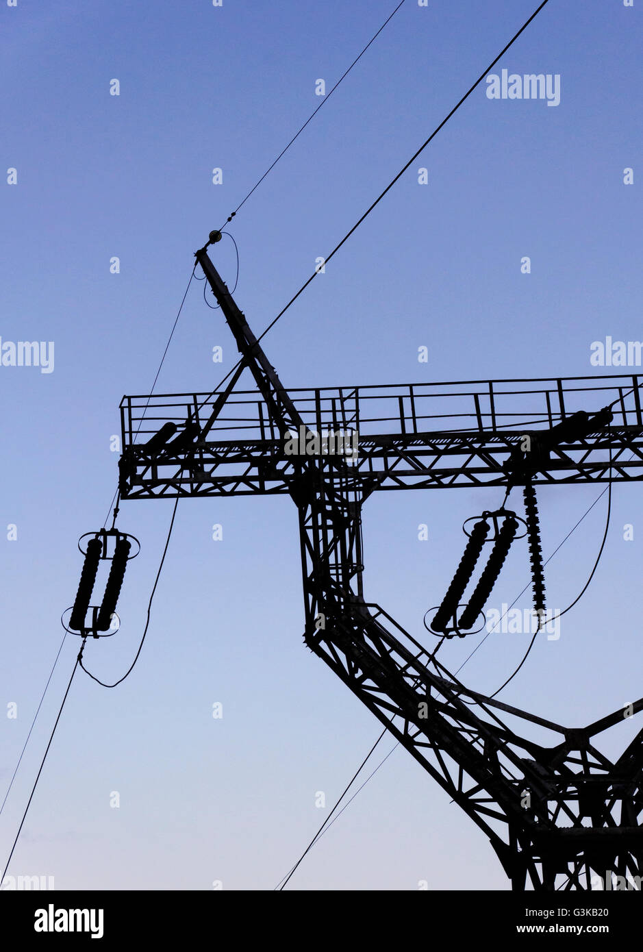 Power line on sunset sky background Stock Photo - Alamy