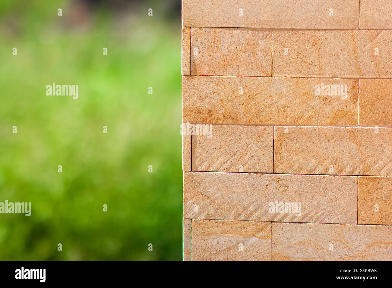 Yellow stone bricks pattern background Stock Photo - Alamy