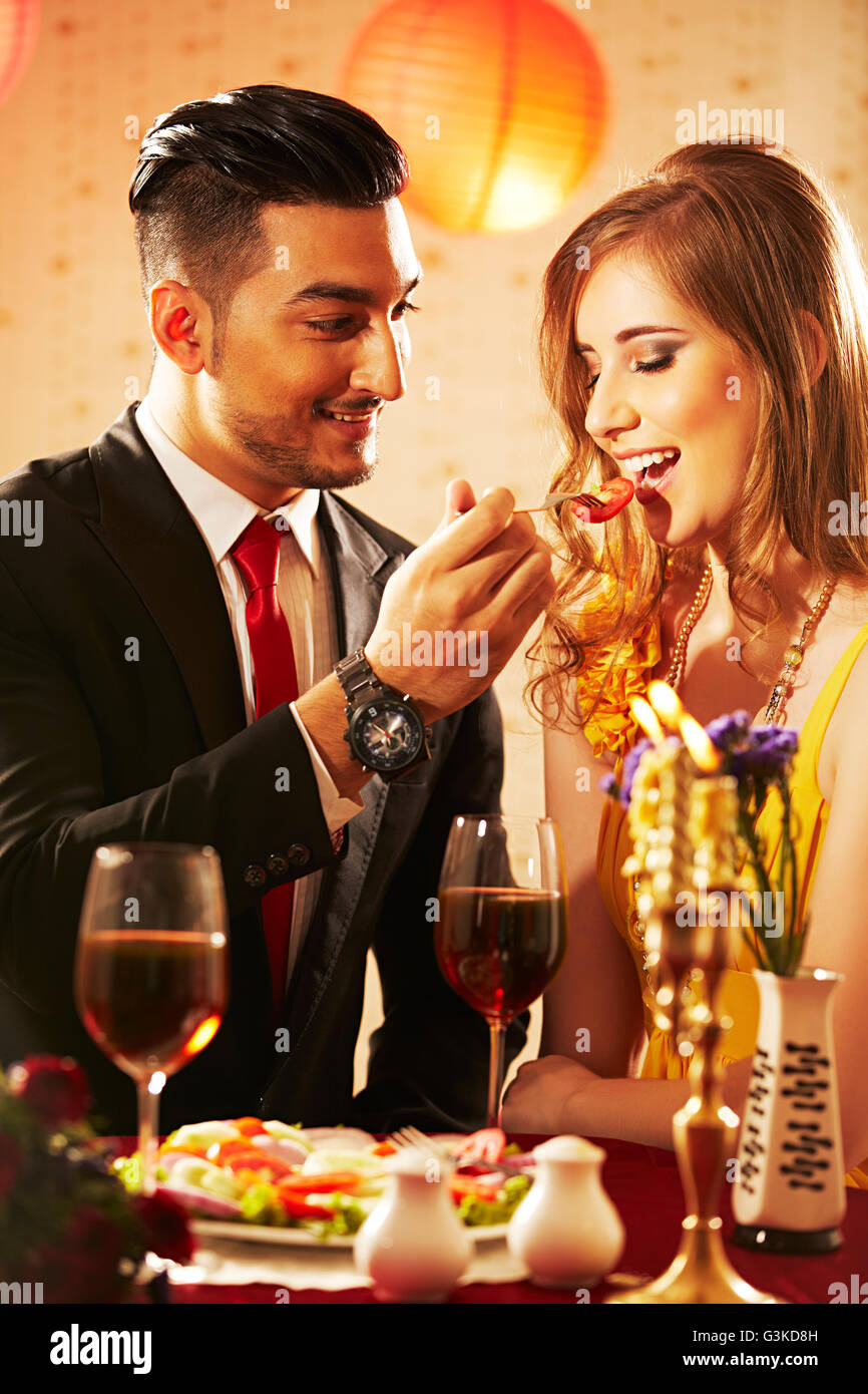 2 Foreigner Married Couples Hotel Dinner Feeding food Stock Photo - Alamy