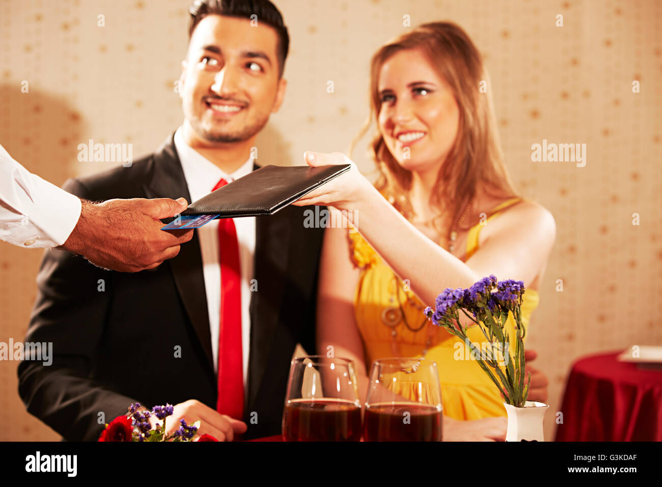 3 People Married Couples Foreigner and Waiter hotel Dinner Giving Bills ...