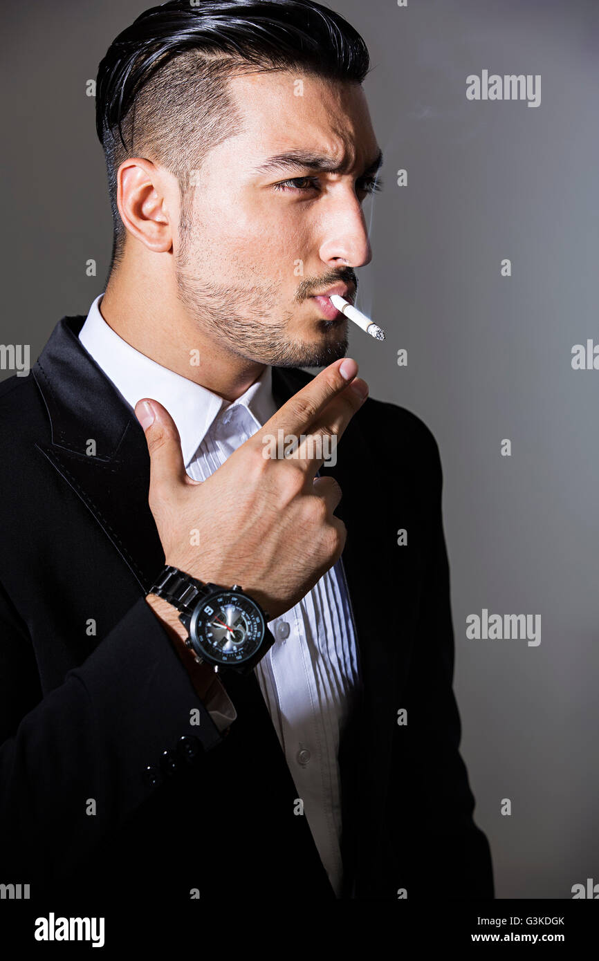 Fashion model smoking cigarette hi-res stock photography and images - Alamy