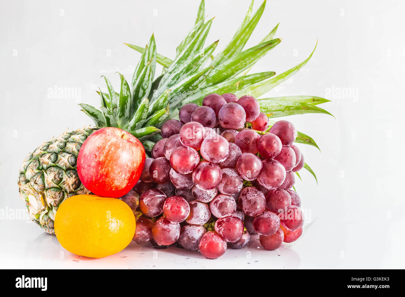Grapes and many fruits on isolated background Stock Photo - Alamy