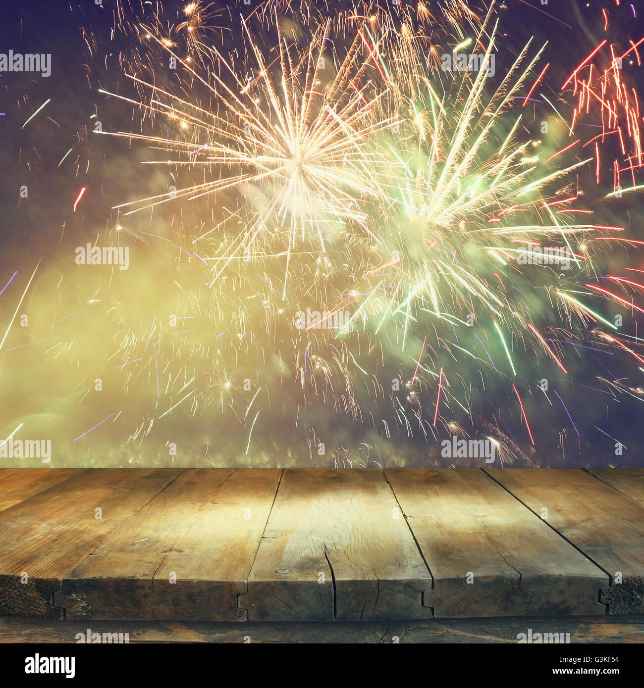 image of wooden table in front of blurred fireworks background Stock ...