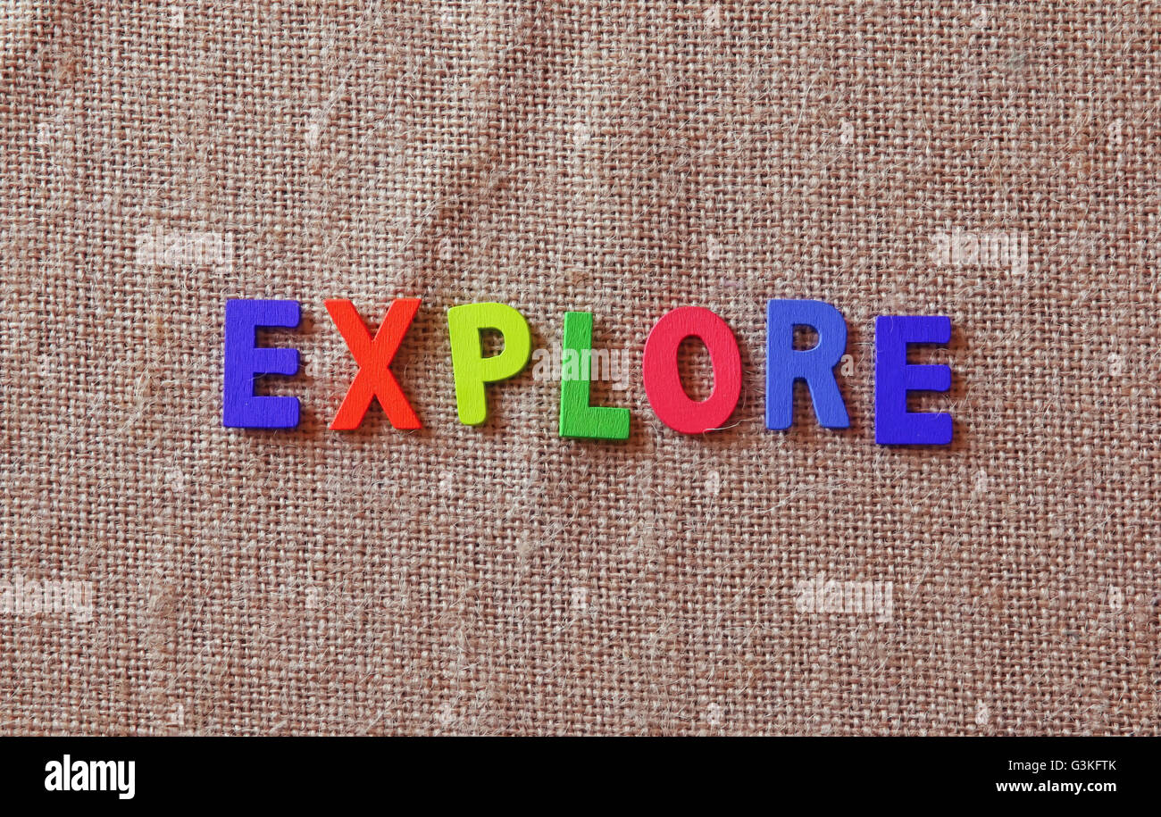 top view image of colorful wooden letters with phrase: EXPLORE on ...
