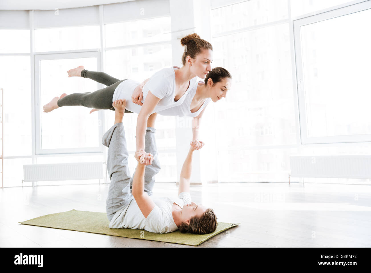 Acro yoga two people practice hi-res stock photography and images - Alamy