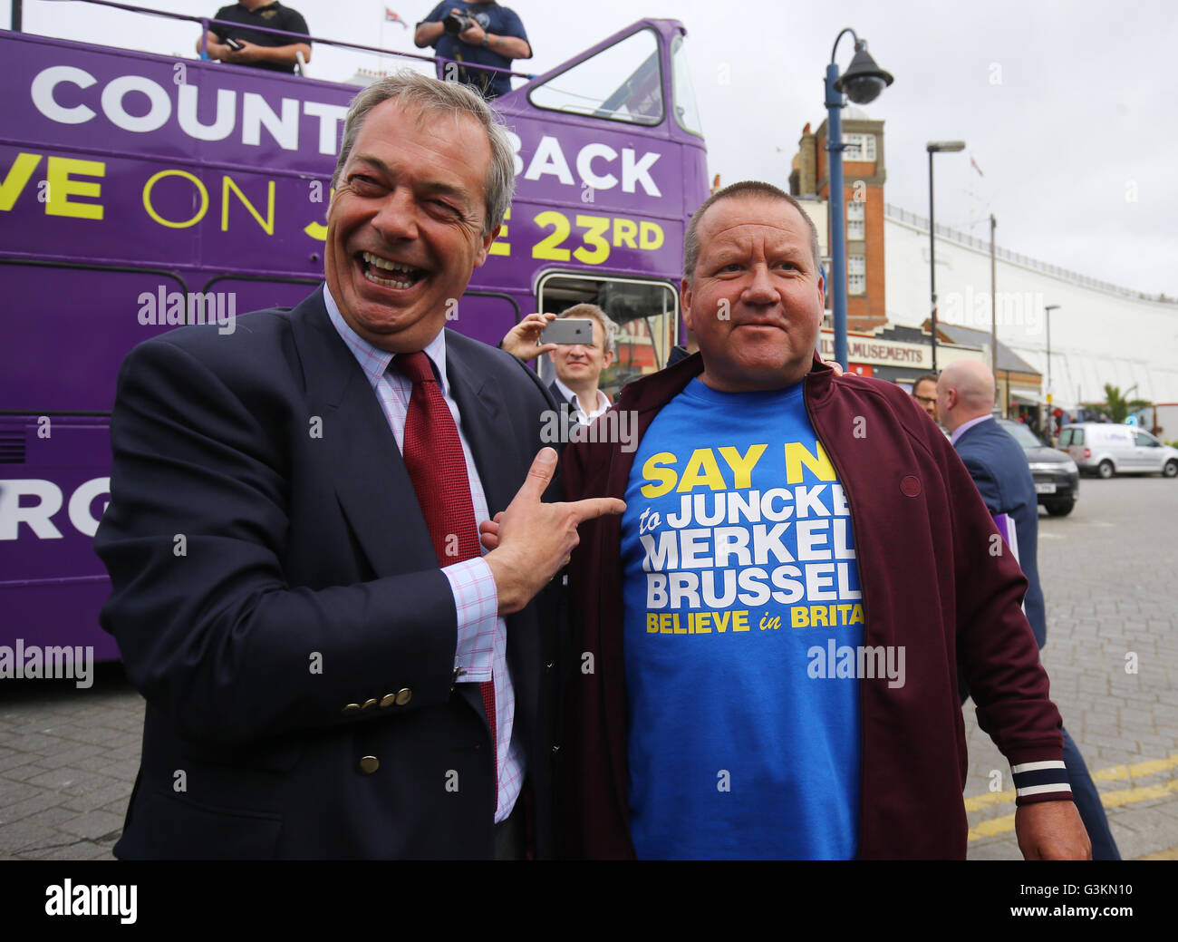 Ukip leader Nigel Farage (left) poses with local Ramsgate taxi driver ...