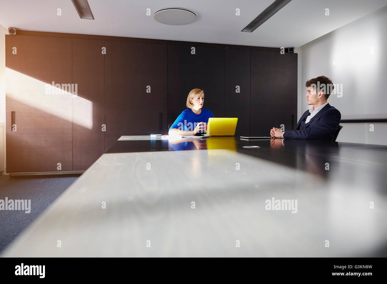 Colleagues in conference room at conference table having meeting Stock ...