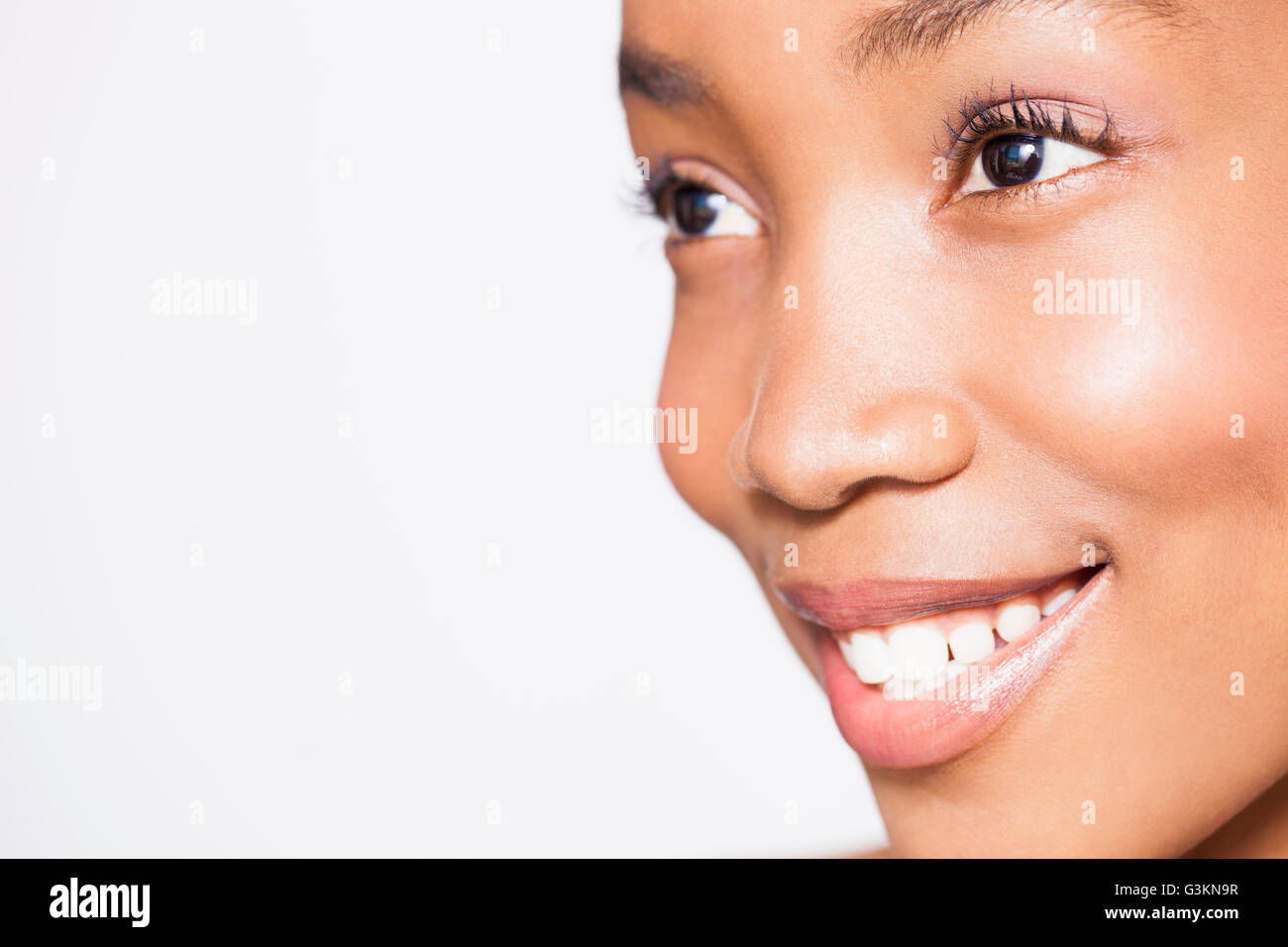 Portrait of young woman, smiling, close-up Stock Photo - Alamy