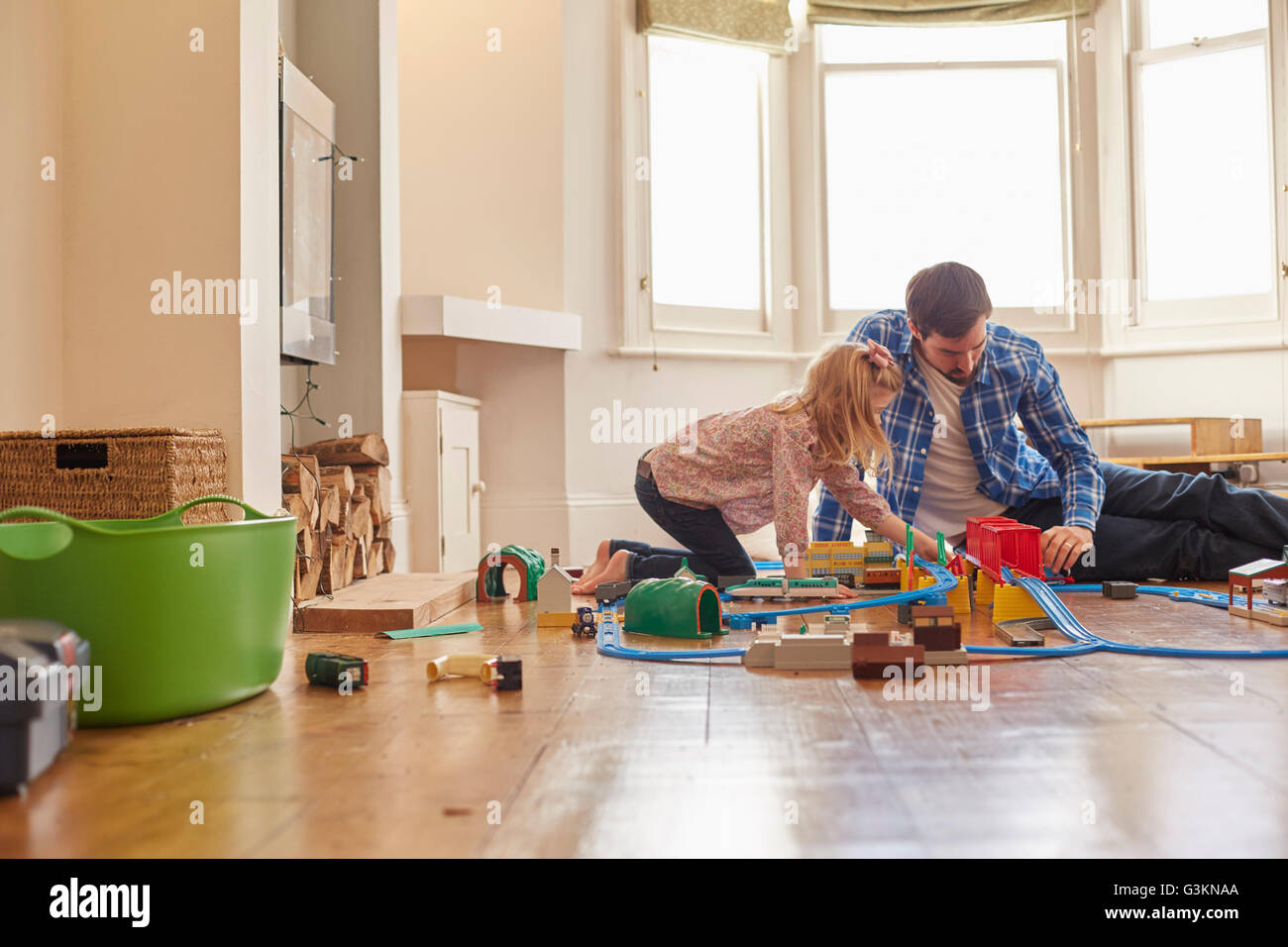 Family playing with train set hi-res stock photography and images - Alamy