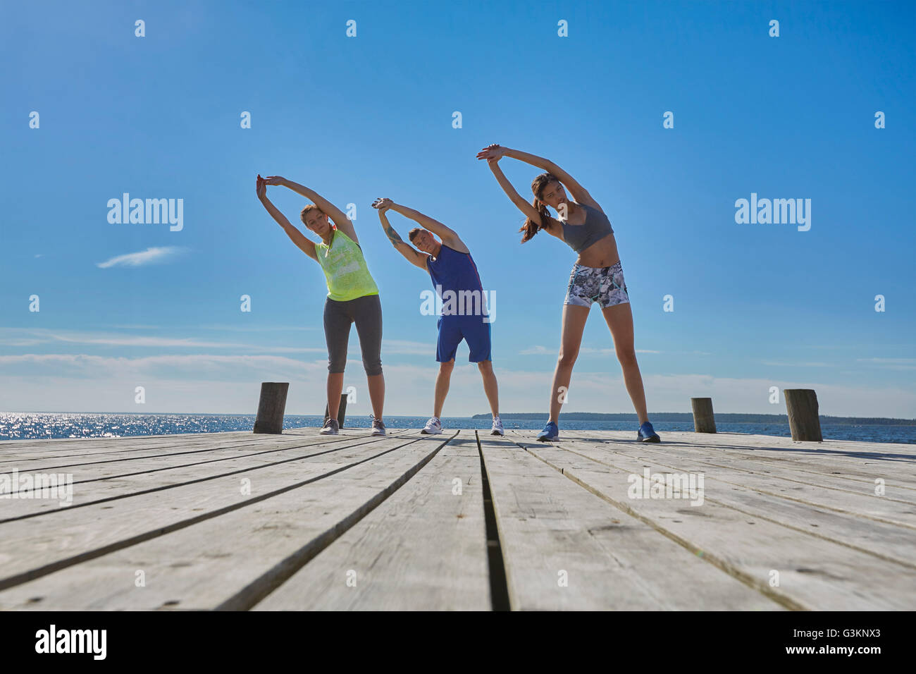 Bending over sideways hi-res stock photography and images - Alamy