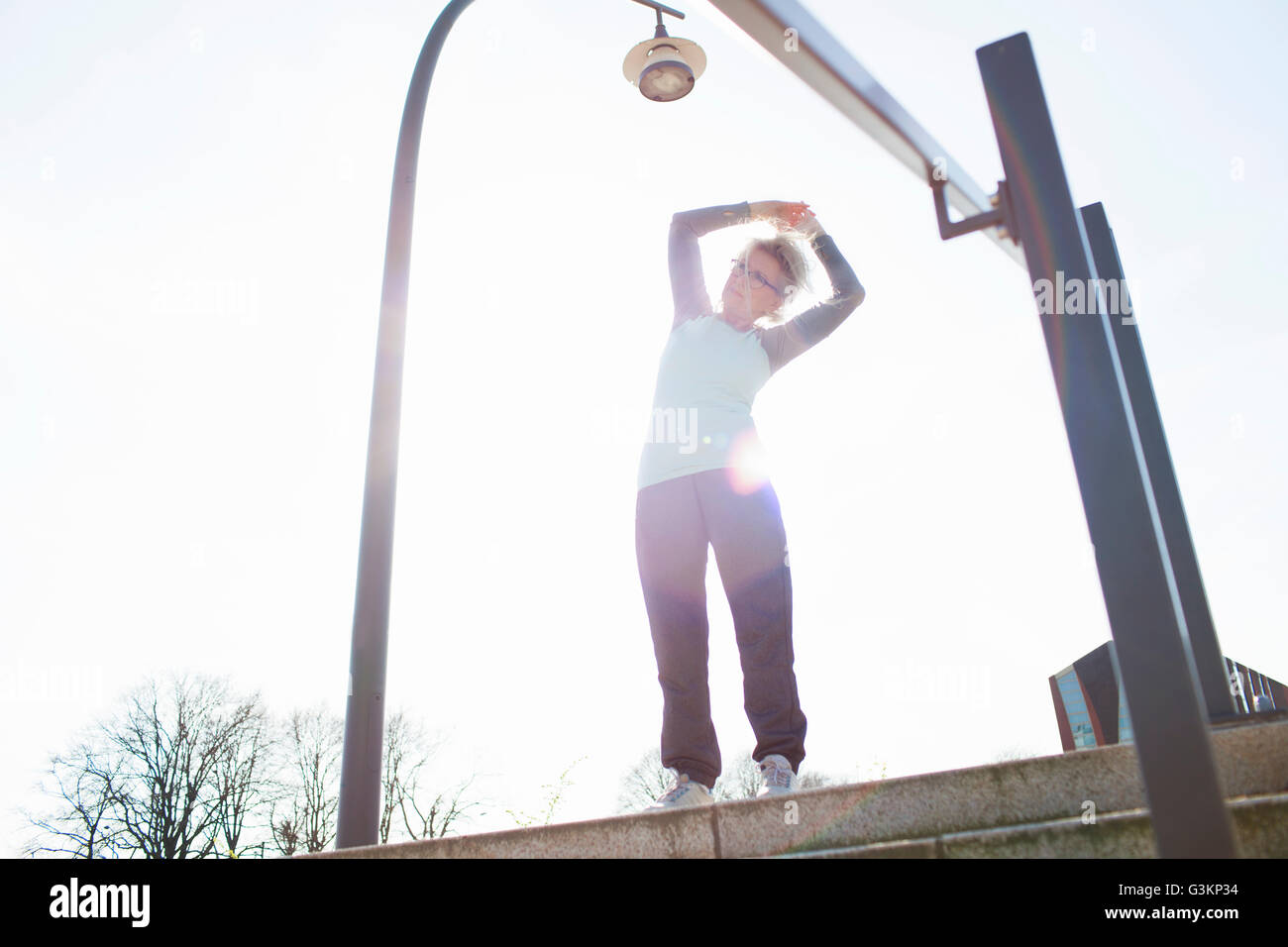 Bending over sideways hi-res stock photography and images - Alamy