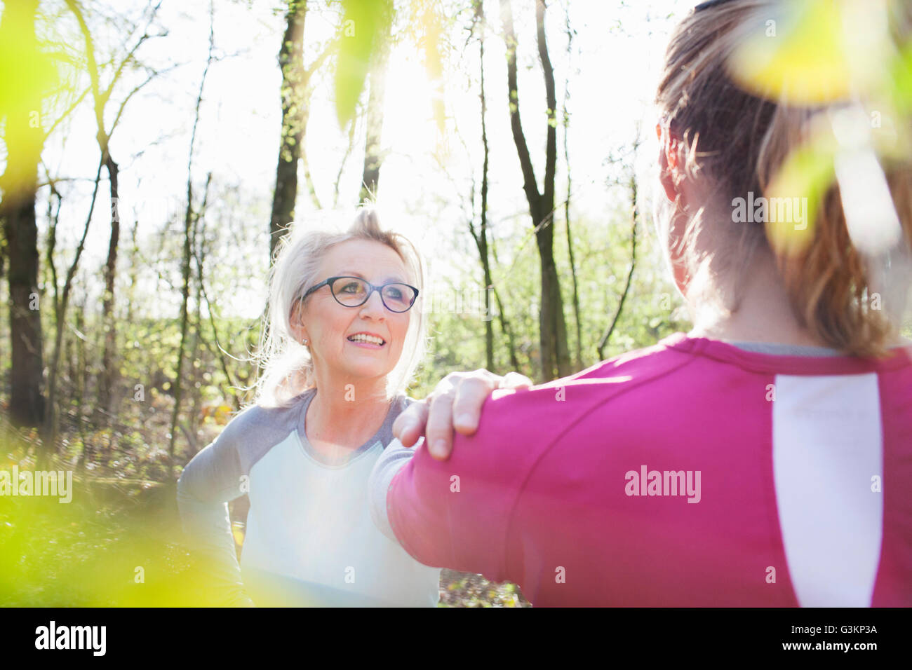 Hand over shoulder stretching hi-res stock photography and images - Alamy