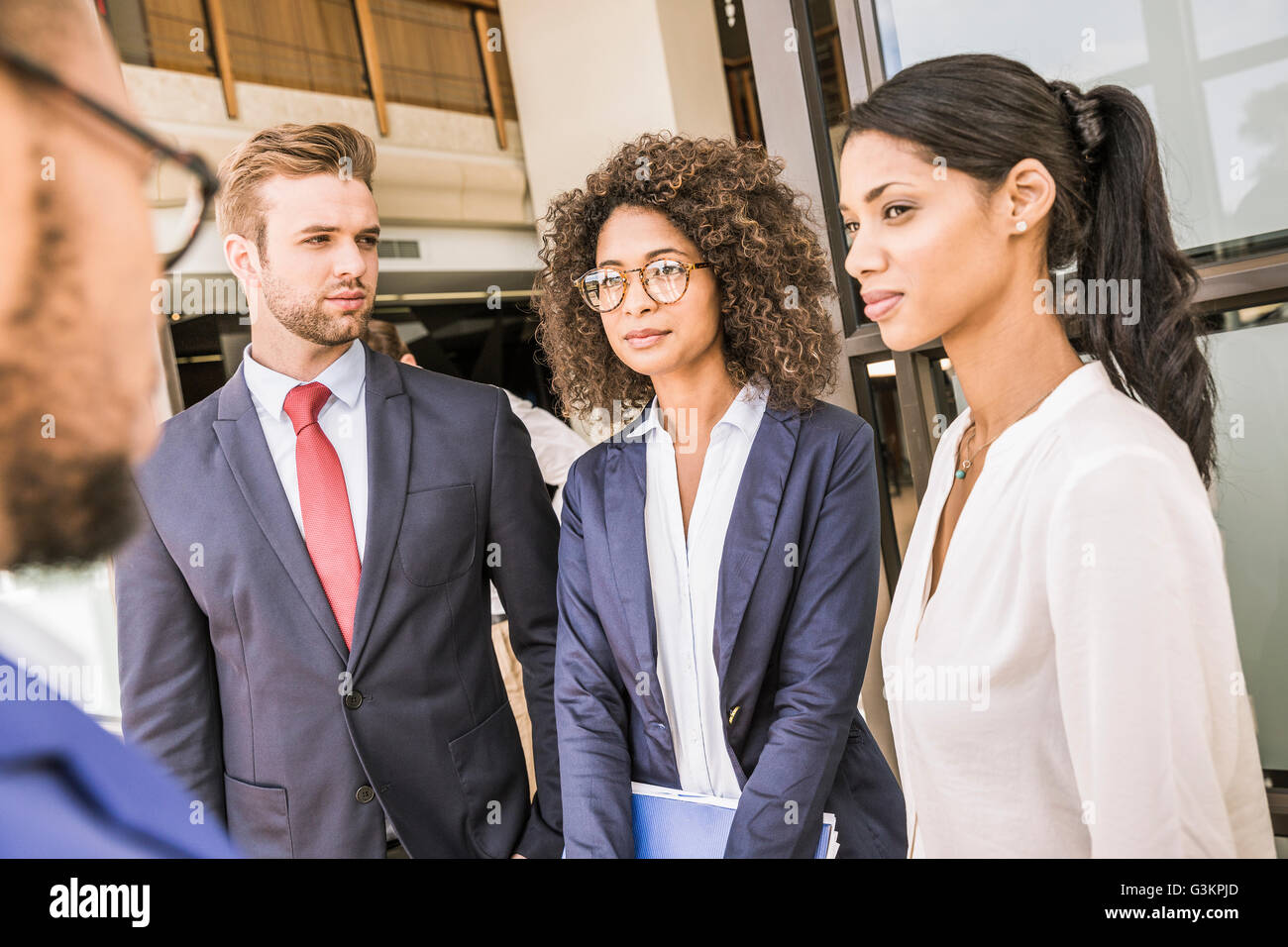 Business people waiting outside office hi-res stock photography and ...