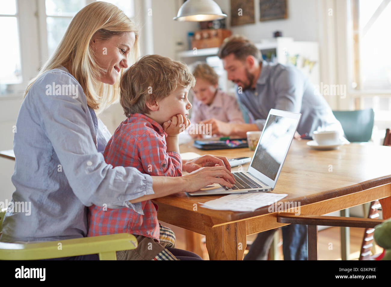 Working parents home hi-res stock photography and images - Alamy