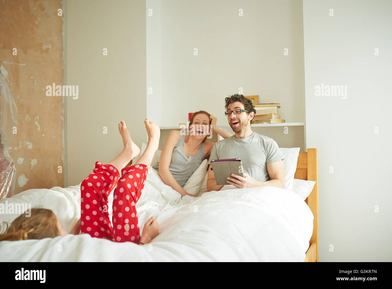 Couple in bed having fun hi-res stock photography and images - Alamy