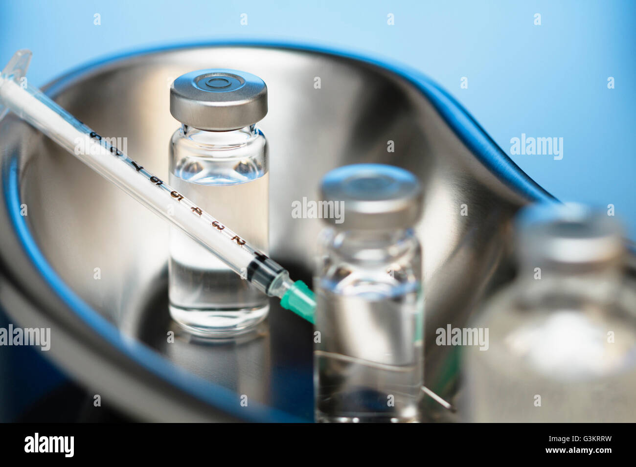 Injectable medications. Kidney dish with injectable medications in ...