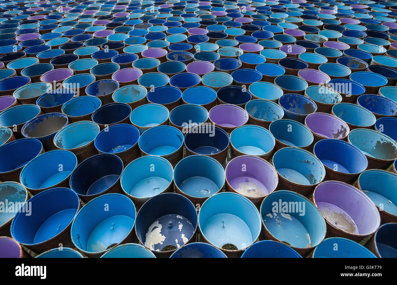 Full frame of painted blue and purple containers Stock Photo - Alamy
