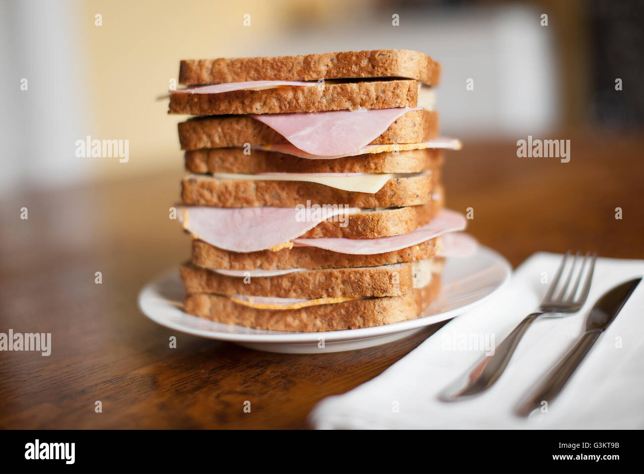 Stack of ham sandwiches on plate Stock Photo - Alamy