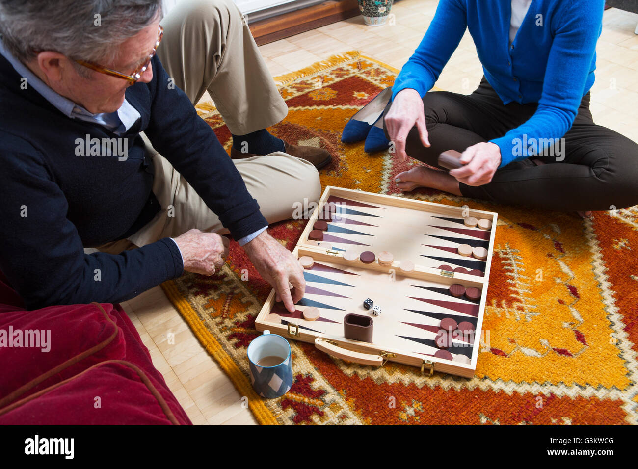Playing backgammon hi-res stock photography and images - Alamy