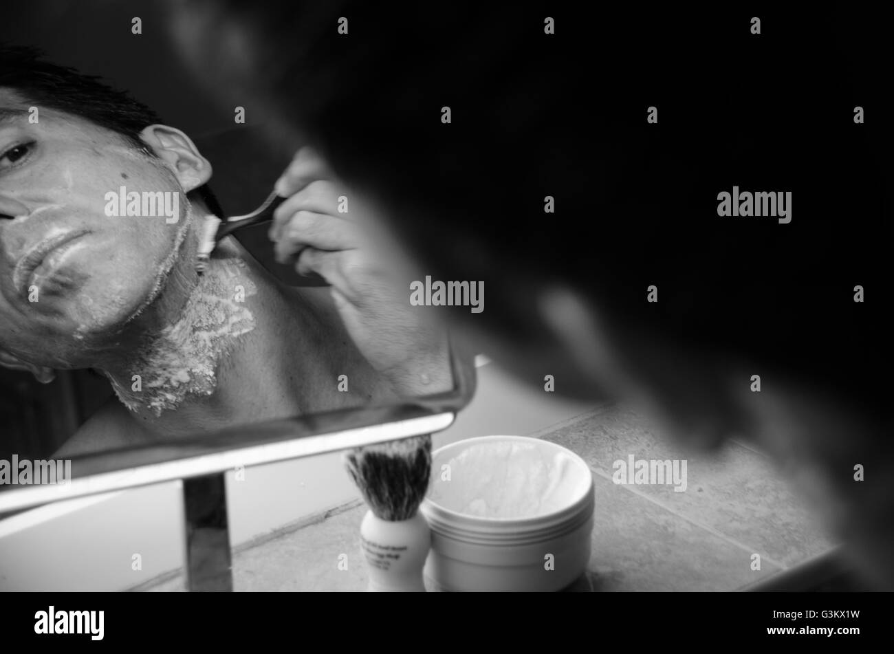 Man razor shaving in Black and White Stock Photos & Images - Alamy
