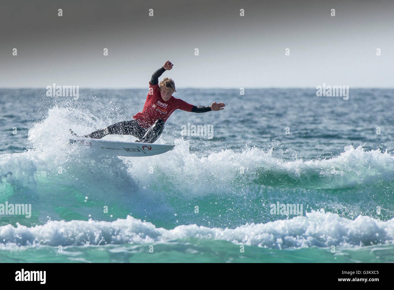 A surfer in spectacular action as he competes in a UK Pro Surf Tour ...