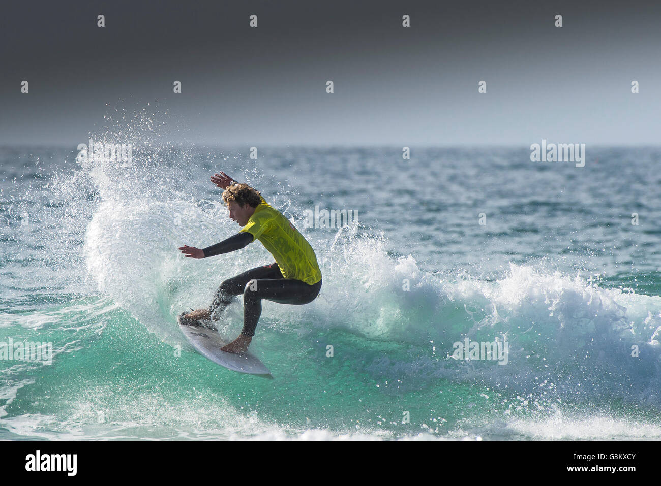 A surfer in spectacular action as he competes in a UK Pro Surf Tour ...