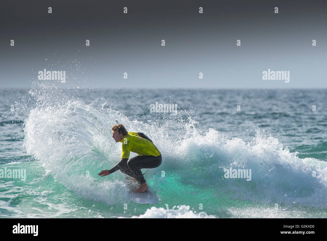 A surfer in spectacular action as he competes in a UK Pro Surf Tour ...