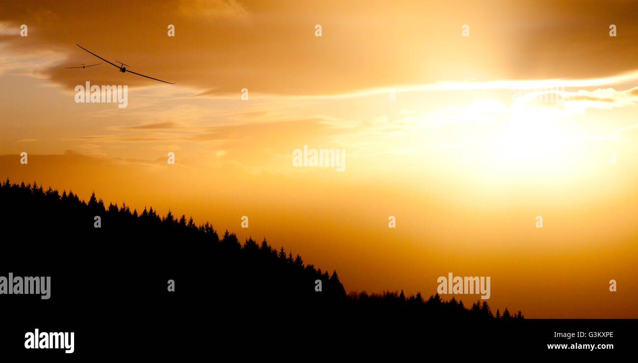 Glider at sunset Stock Photo - Alamy