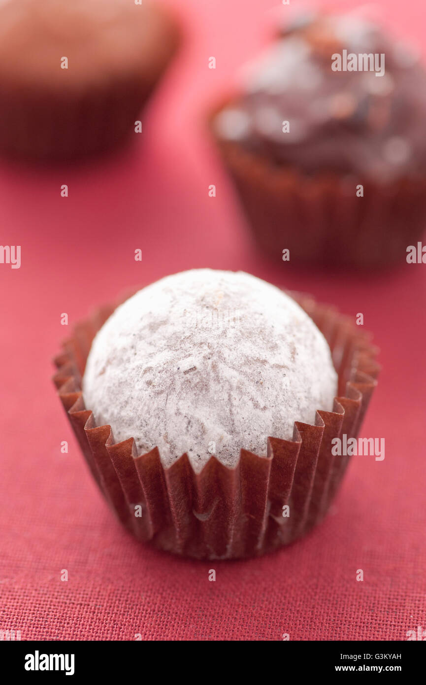 Closeup of chocolate truffles Stock Photo - Alamy