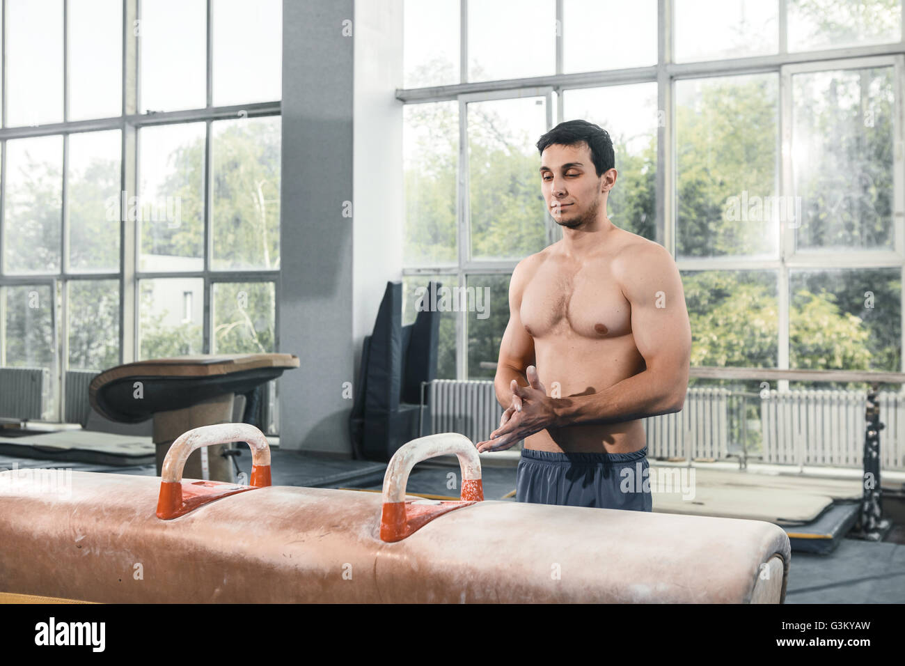 The sportsman before difficult exercise, sports gymnastics Stock Photo ...