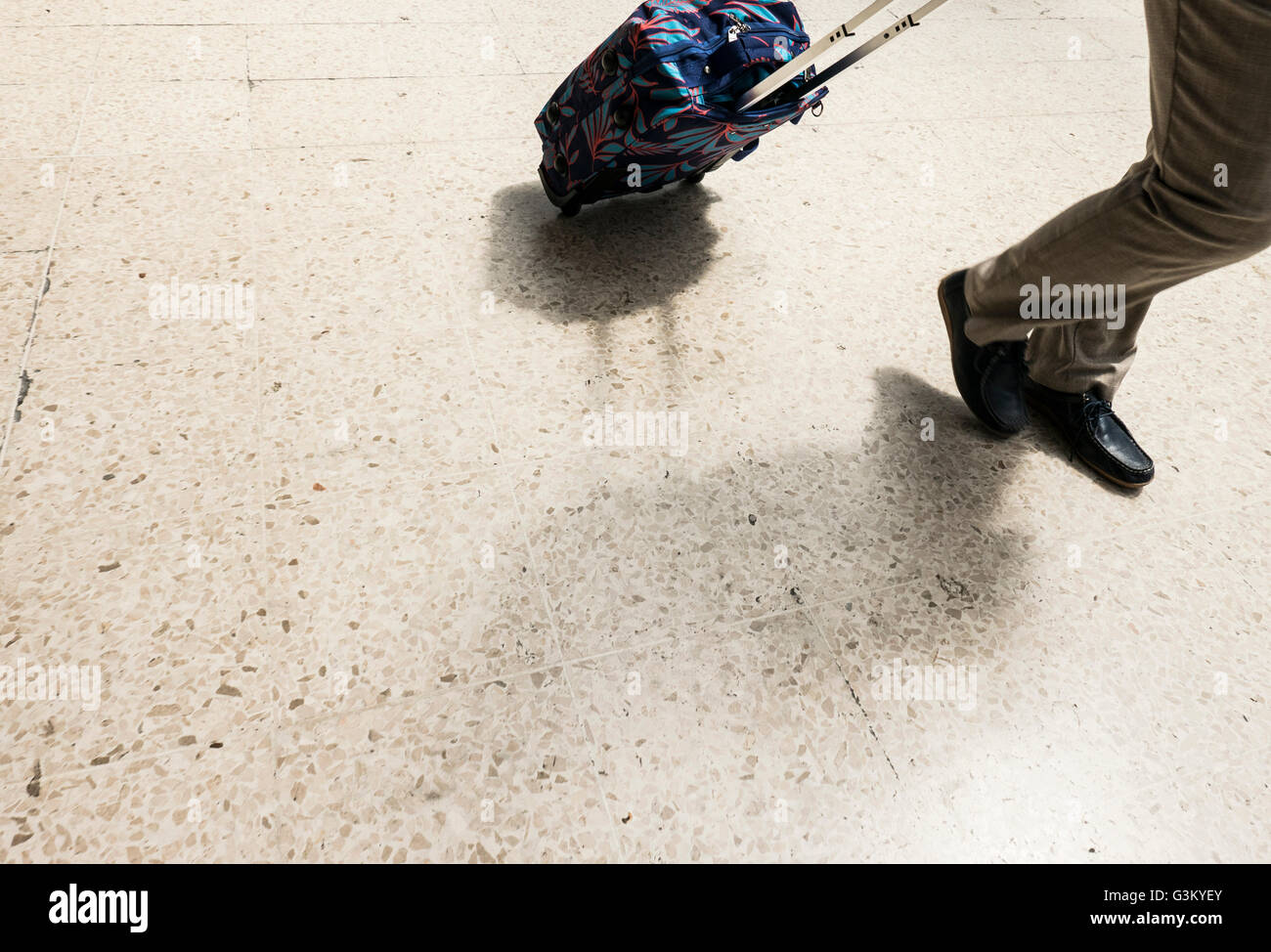 Man Pulling Suitcase, Cropped View Stock Photo - Alamy